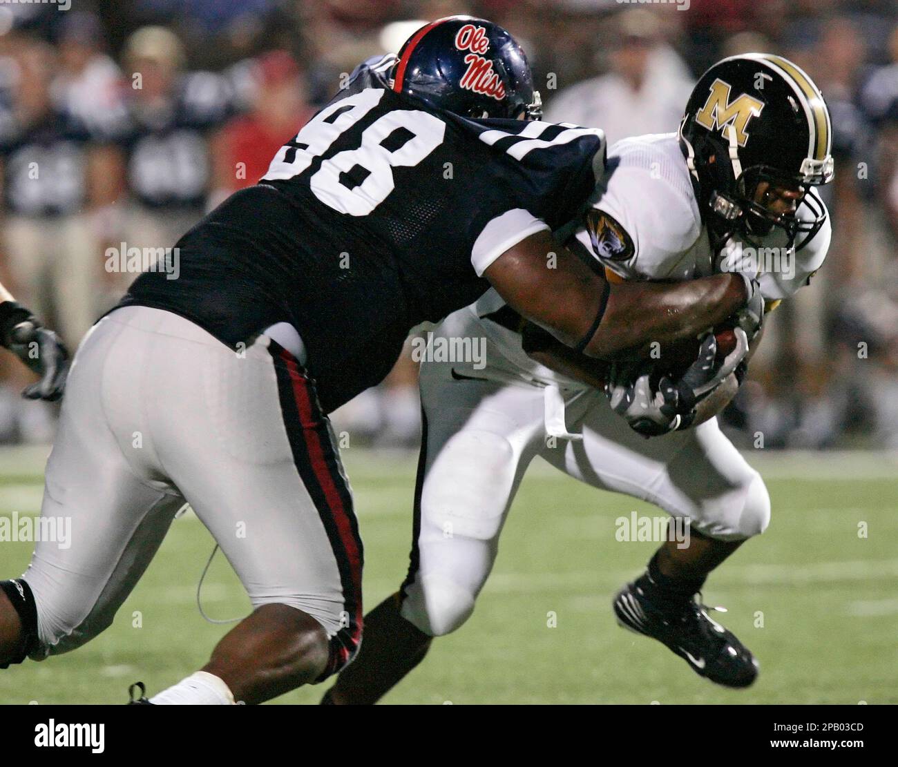 Mississippi defensive lineman Peria Jerry (98) tackles Missouri ...
