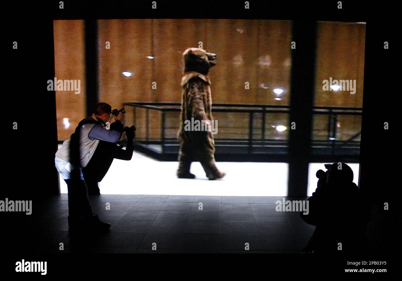 Photographers photograph a work by shortlisted artist Mark Wallinger ...