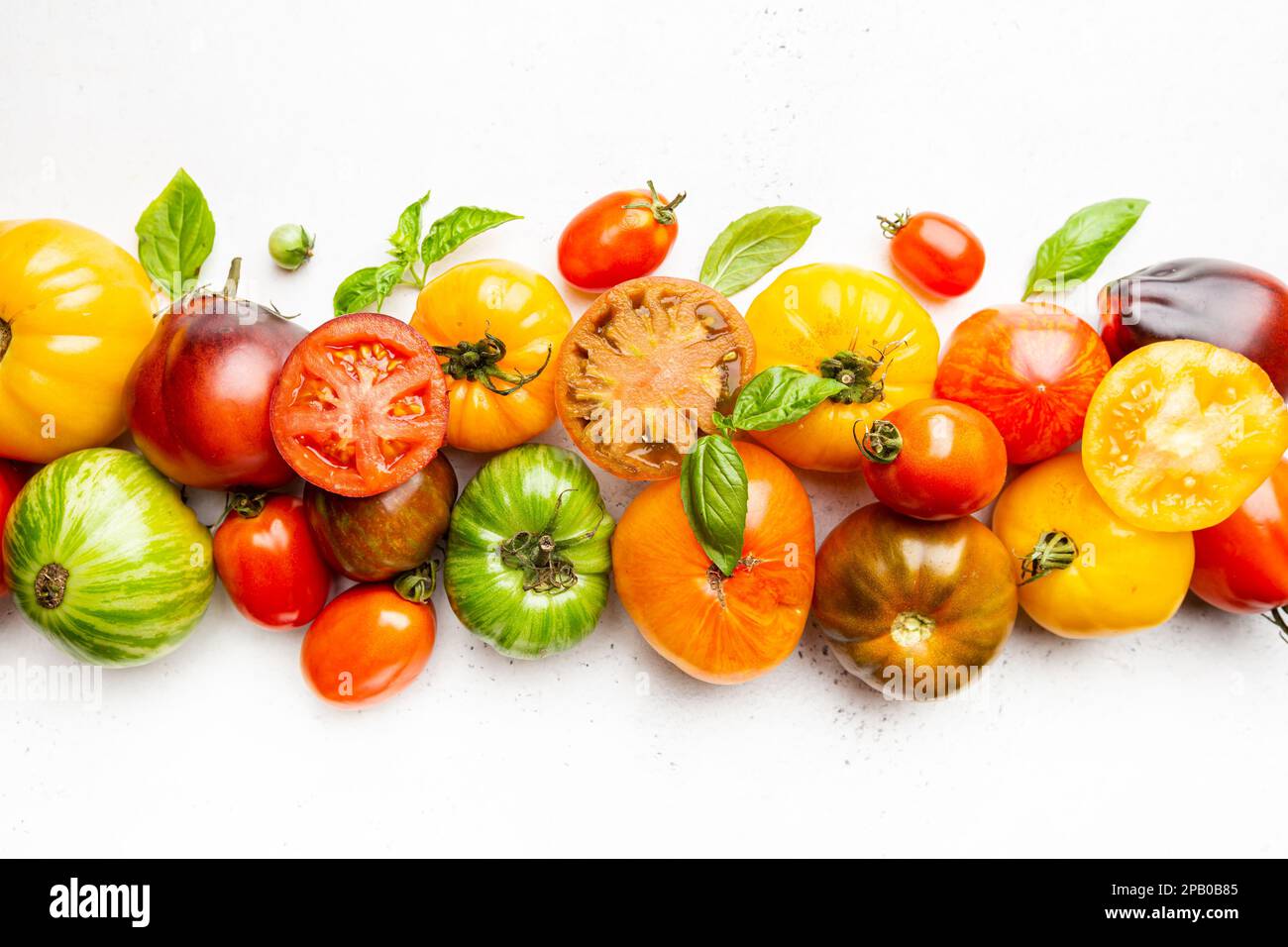 Mixed tomatoes top view Stock Photo - Alamy