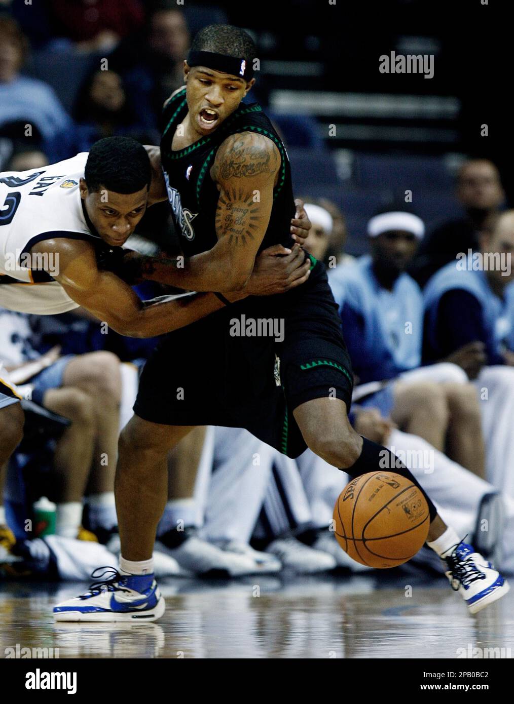 Memphis Grizzlies forward Rudy Gay, left, fouls Minnesota Timberwolves ...