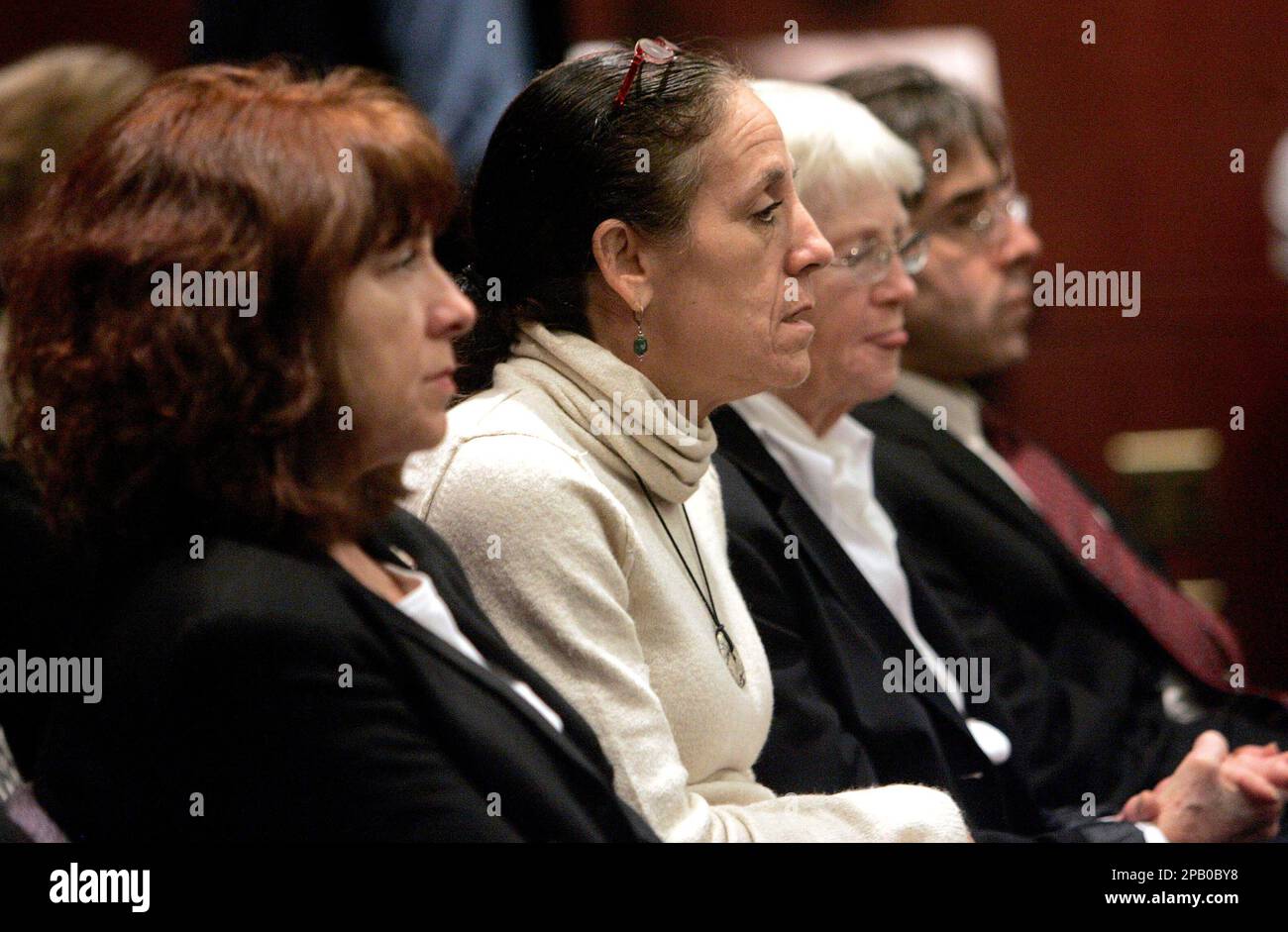 Members of Connecticut state Sen. Louis DeLuca's family listen to him ...