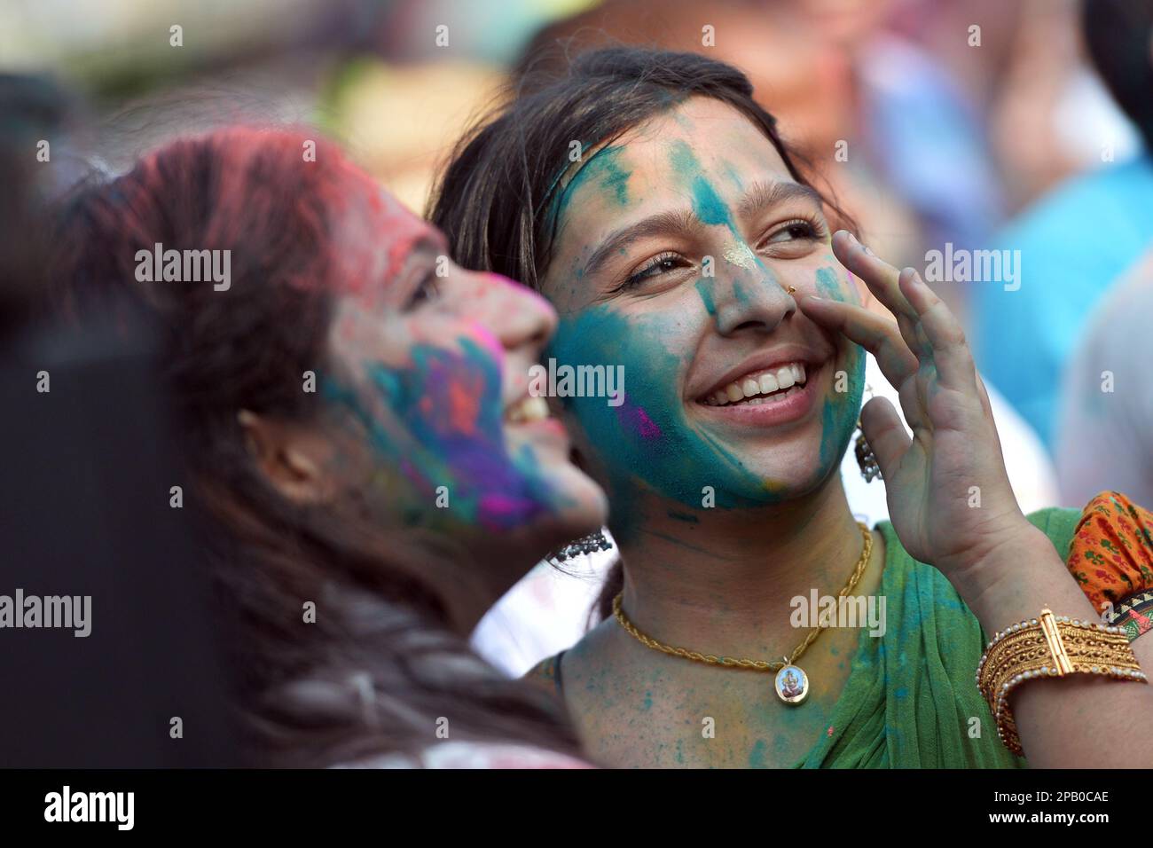 Pattaya, Thailand. 11th Mar, 2023. People play with colored powder to ...