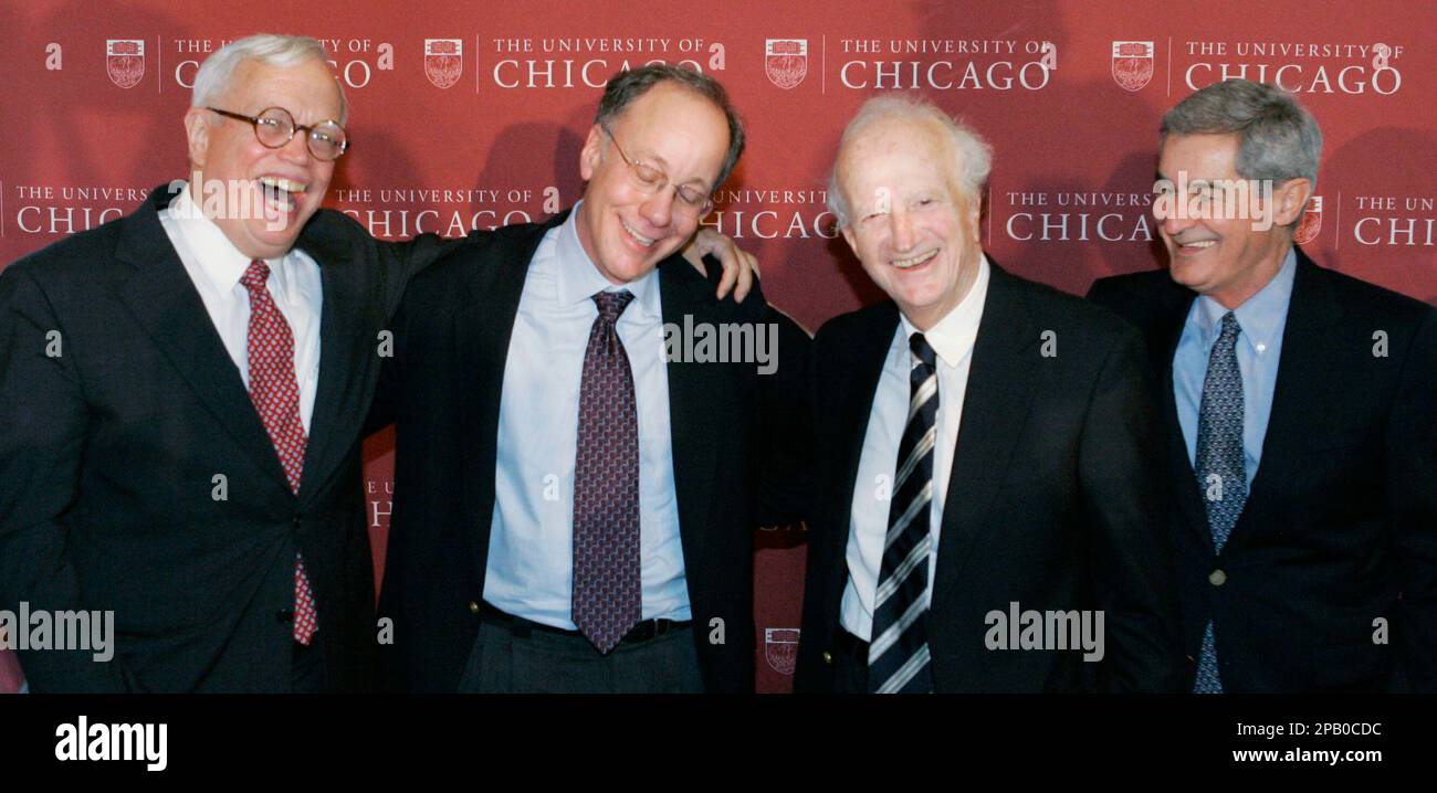 University of Chicago professor Roger B. Myerson, second from left ...