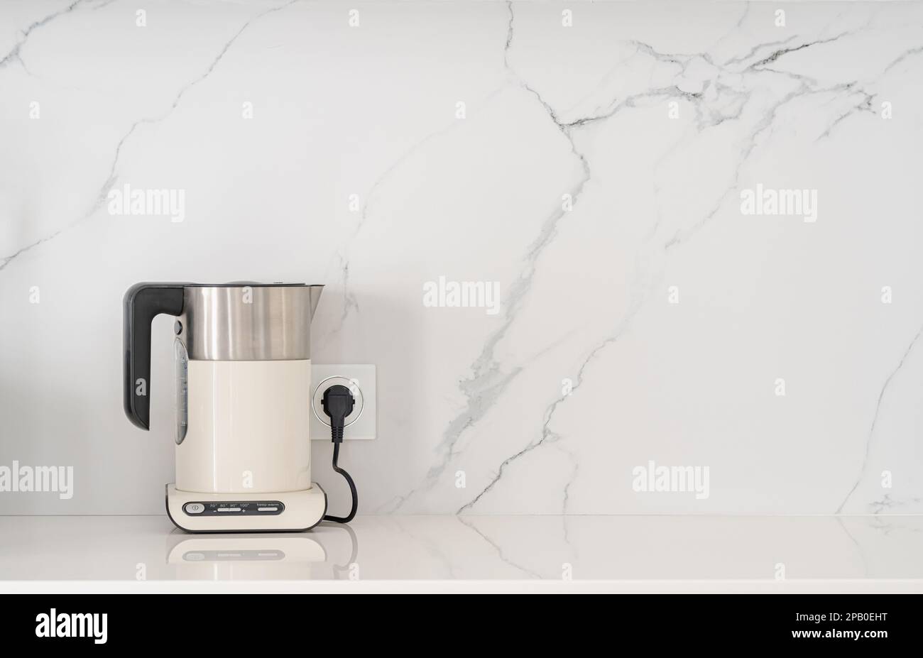 Modern white electric kettle Stock Photo - Alamy