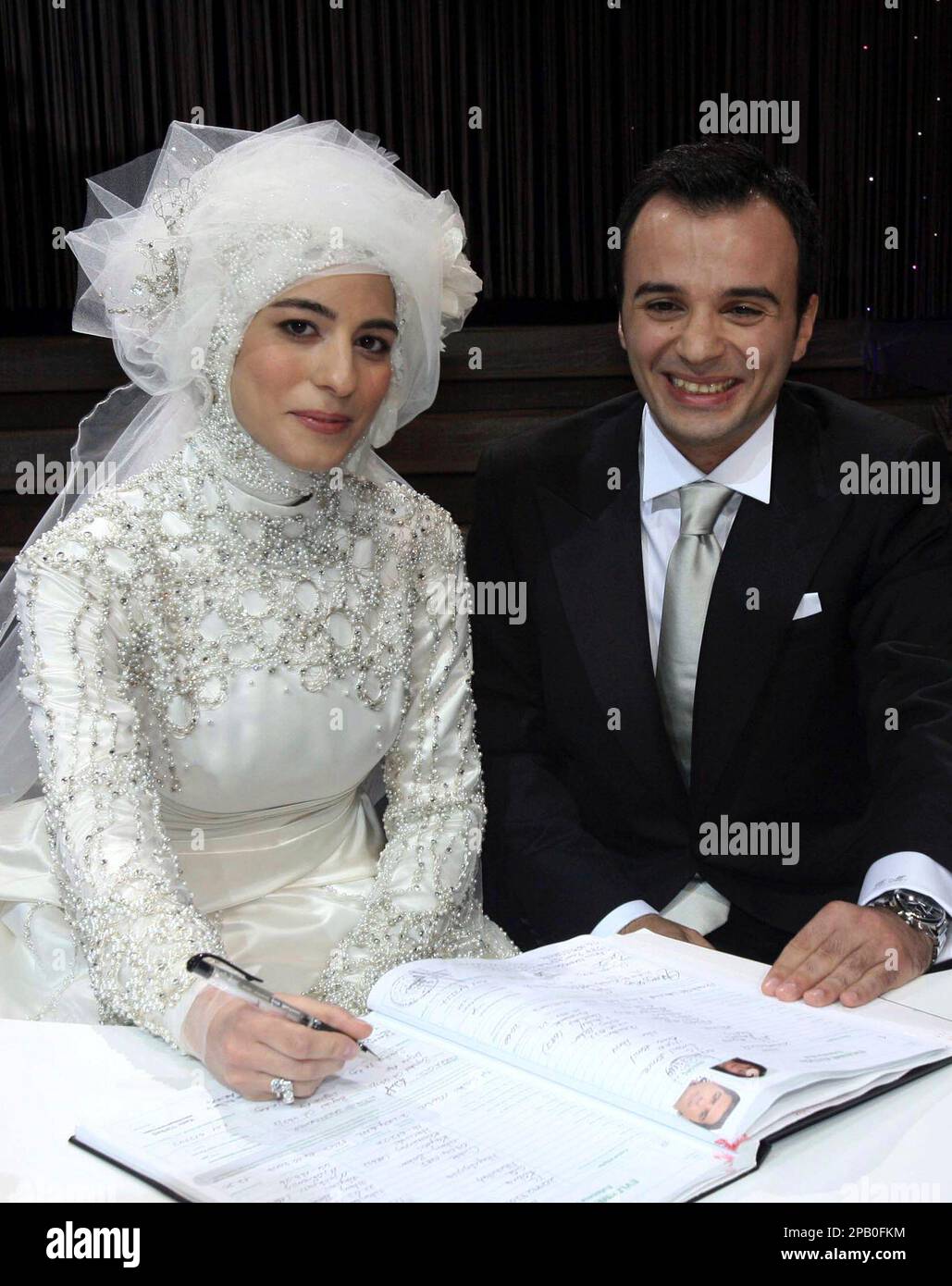 Kubra Gul, left, daughter of the Turkish President Abdullah Gul, and ...
