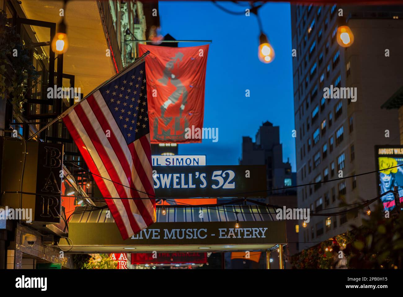 Night cityscape view of downtown Broadway and famous MJ musical in Neil ...