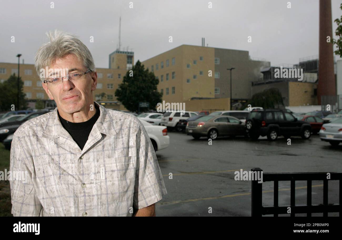 Robert Whitney poses for a photograph outside Sturdy Memorial Hospital ...