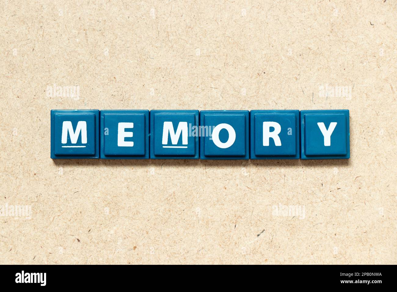 Tile alphabet letter in word memory on wood background Stock Photo - Alamy