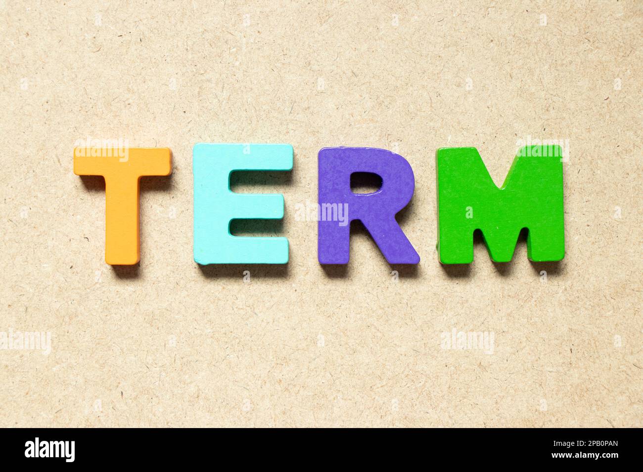 Color alphabet letter in word term on wood background Stock Photo - Alamy