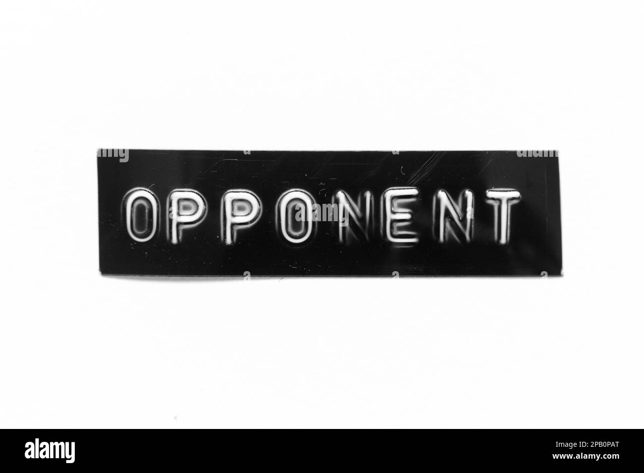Black color banner that have embossed letter with word opponent on ...