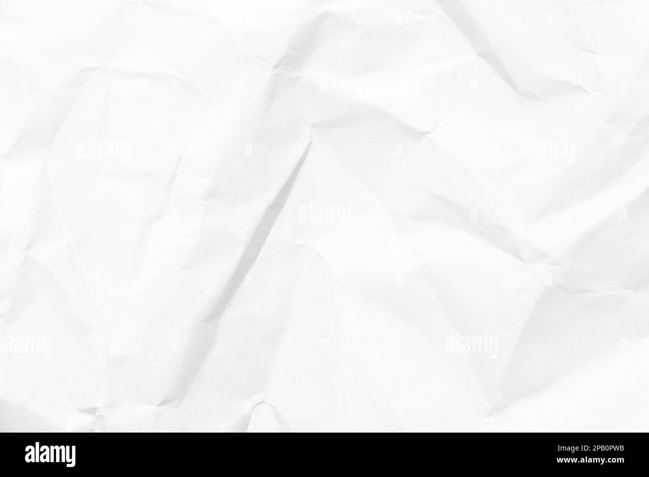 Grunge wrinkled white color paper textured background with copy space ...