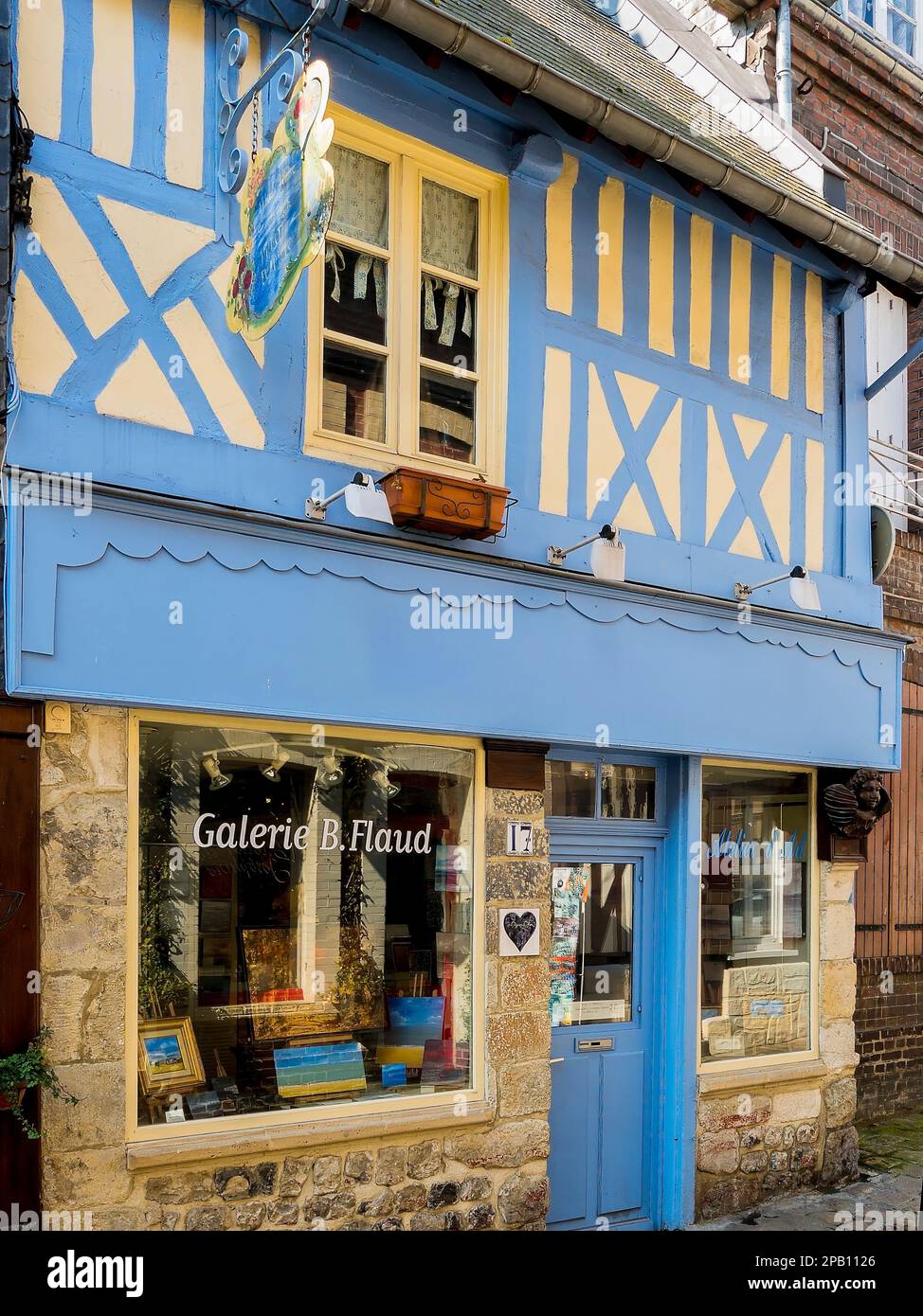 Blue hanging sign shop displays hi-res stock photography and images - Alamy