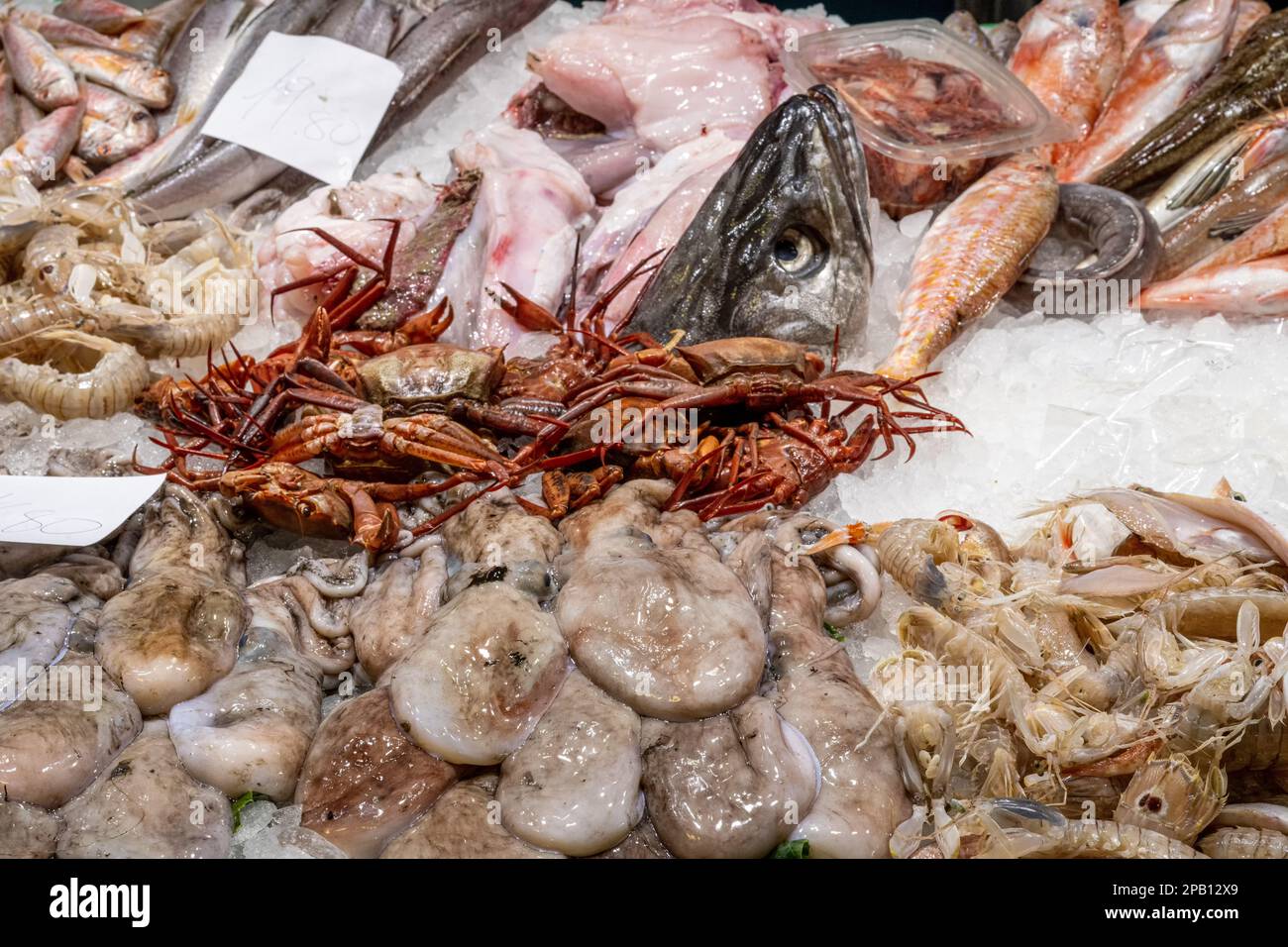 Fresh fish and seafood for sale at a market in Spain Stock Photo - Alamy