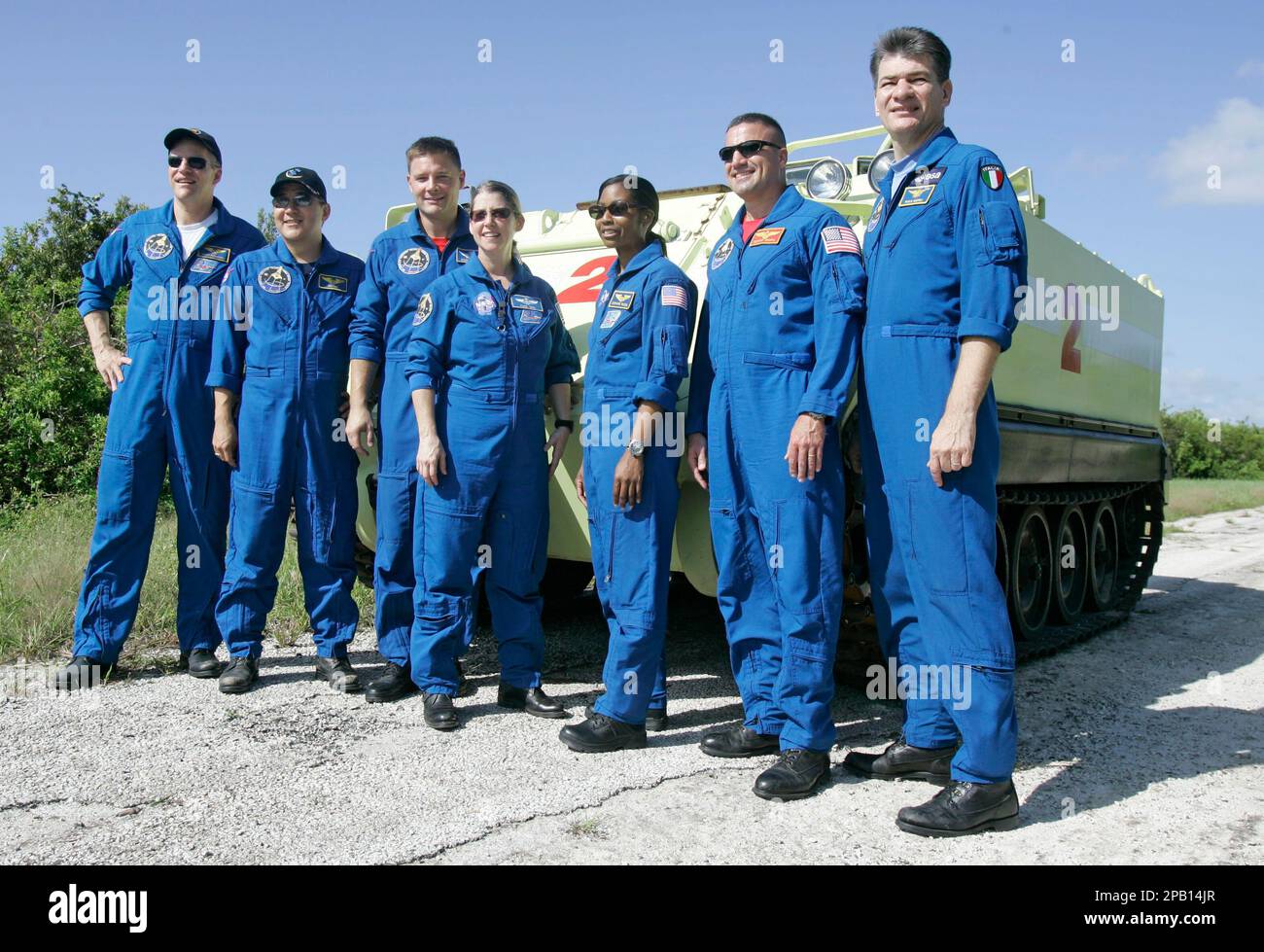 Space shuttle Discovery crew, from left, mission specialist's Scott Parazynski, Daniel Tani and ...