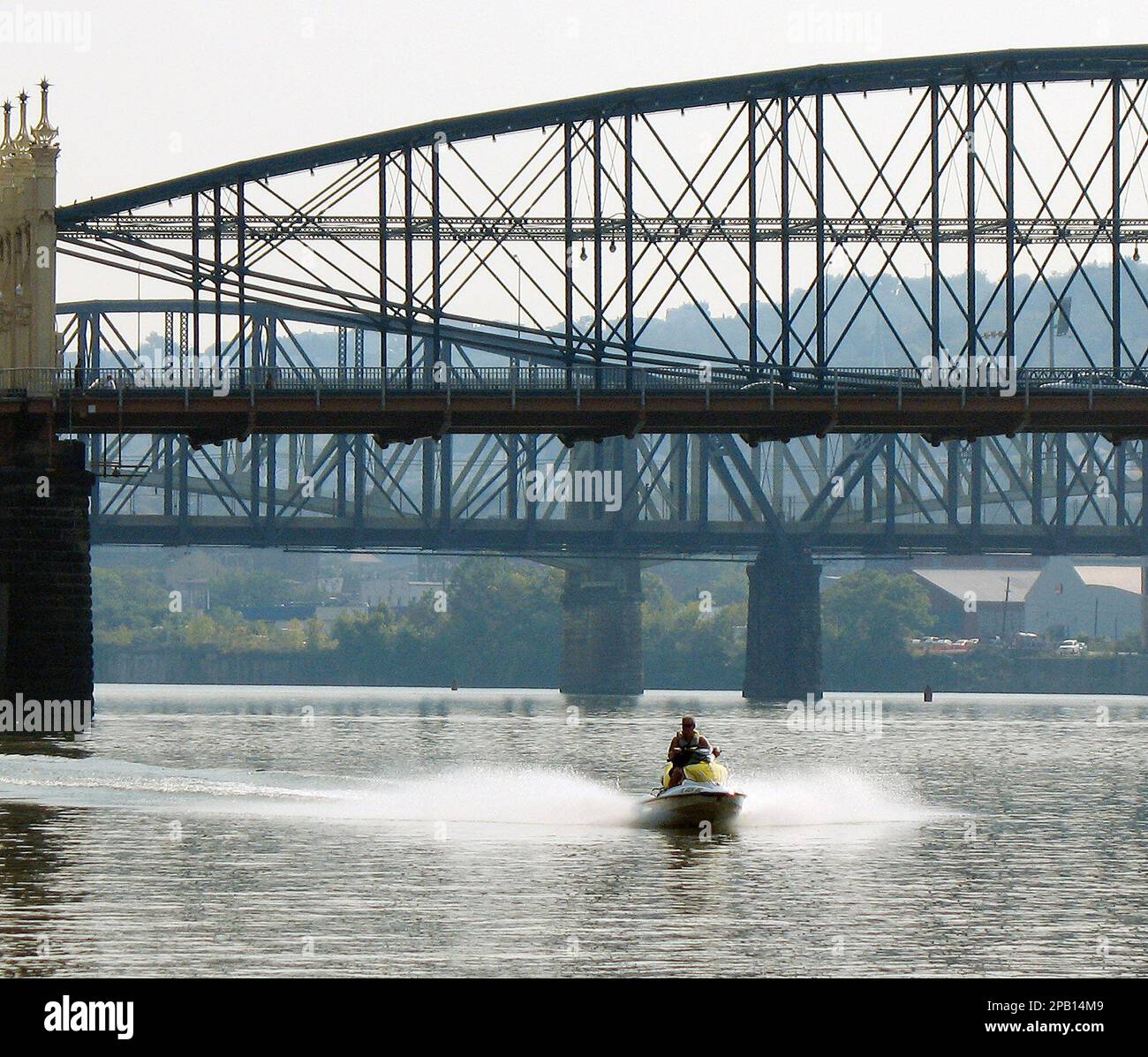 A man takes advantage of the unseasonable temperatures in the 80's to ...