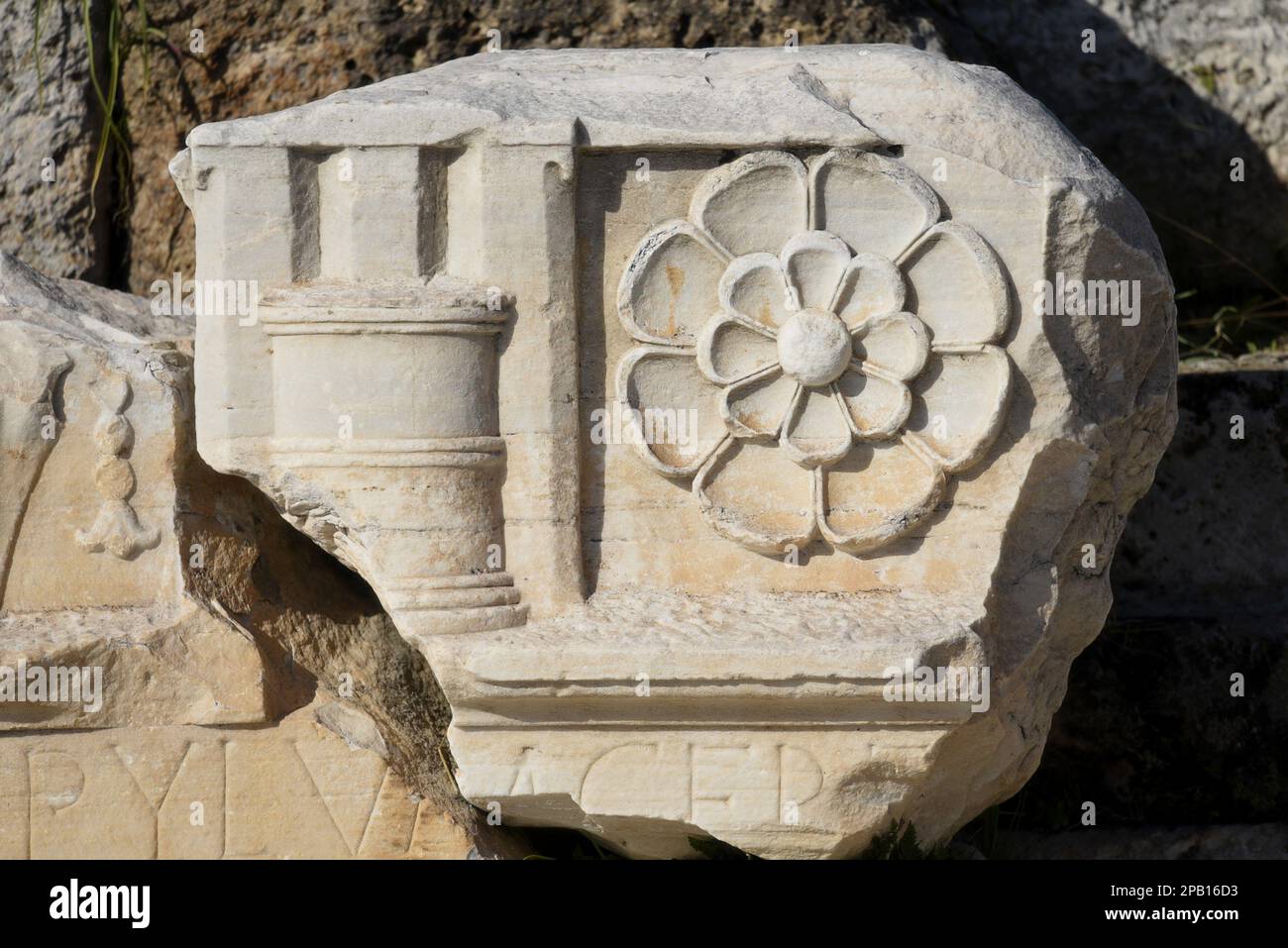 Ancient Greek marble sculpted flower rosette at the Sanctuary of ...