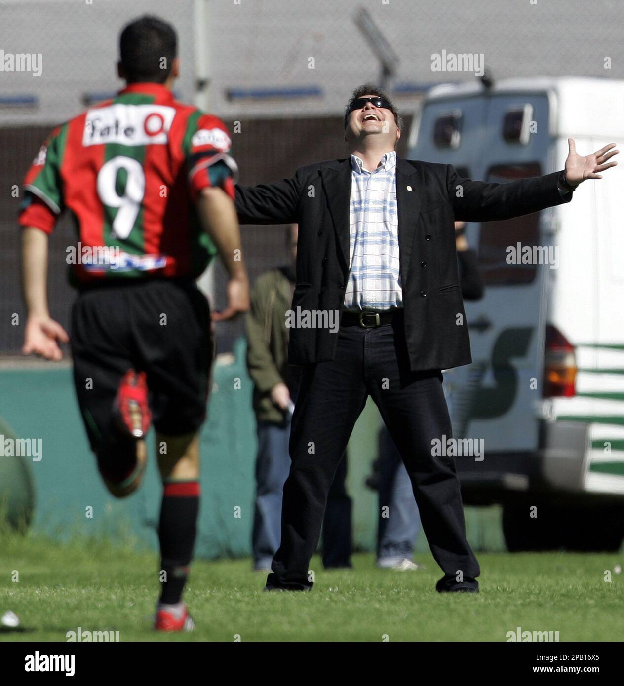 Rampla Junior's coach Luis Lopez, right, celebrates after his player ...