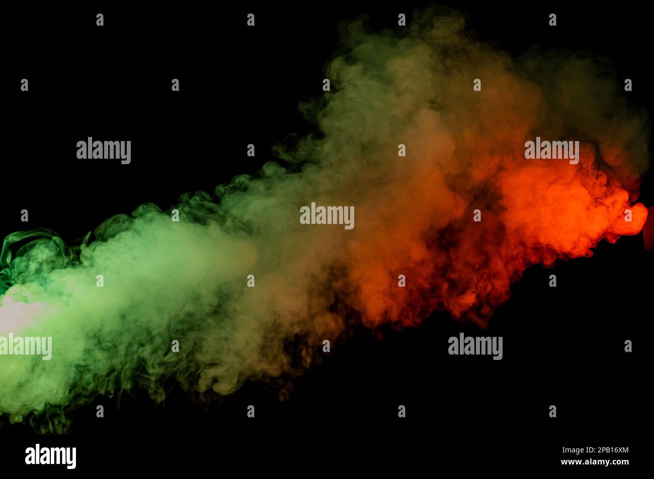 Red yellow green smoke on a black background Stock Photo - Alamy