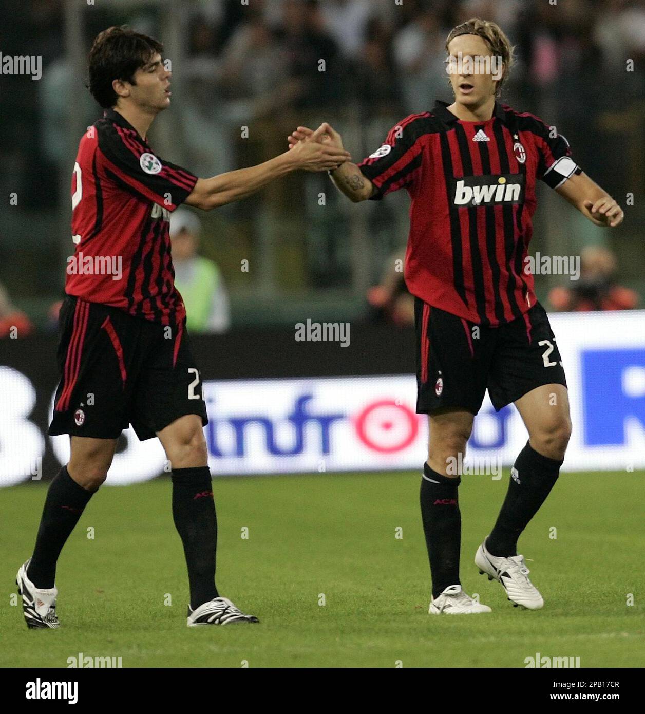 AC Milan Massimo Ambrosini, right, is cheered by teammate Kaka of ...