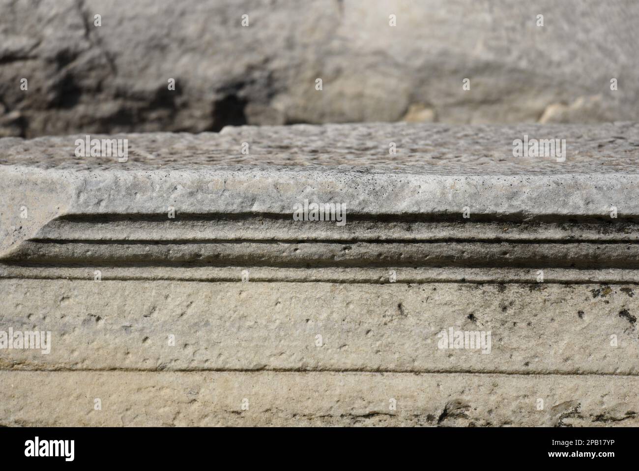 Ancient sculpted marble slab at the Archaeological Site of Eleusis in ...