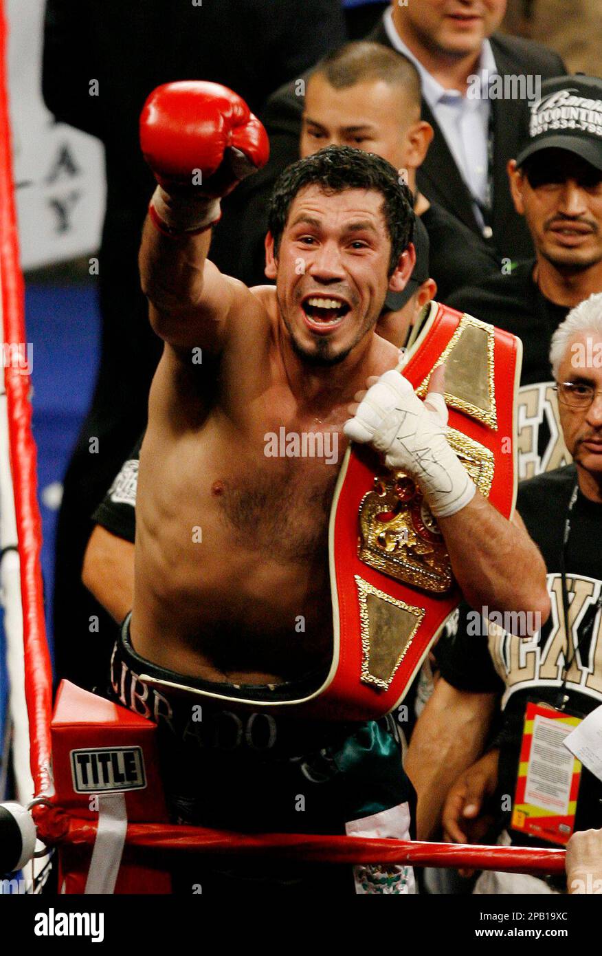 Librado Andrade celebrates his victory over Yusaf Mack following their ...