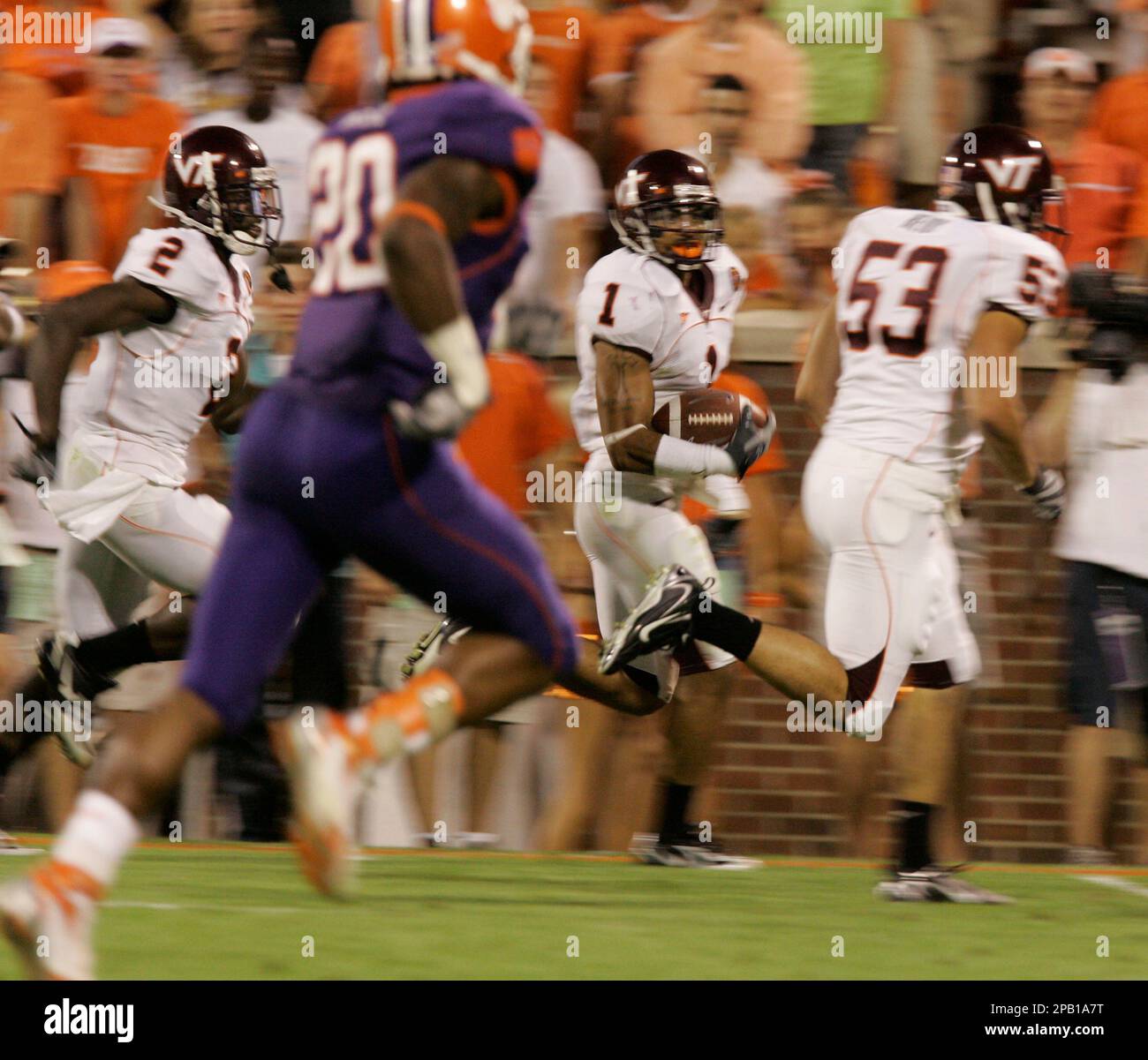 Virginia Tech's Victor Harris (1) runs for a touchdown on a kick off ...