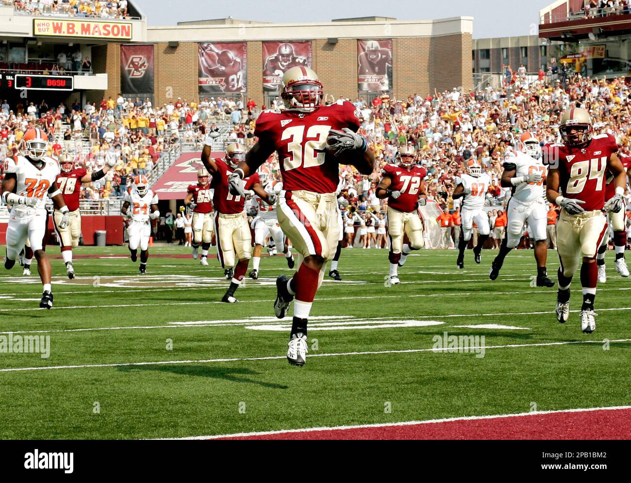Boston College running back Andre Callender (32) races to the goal line ...