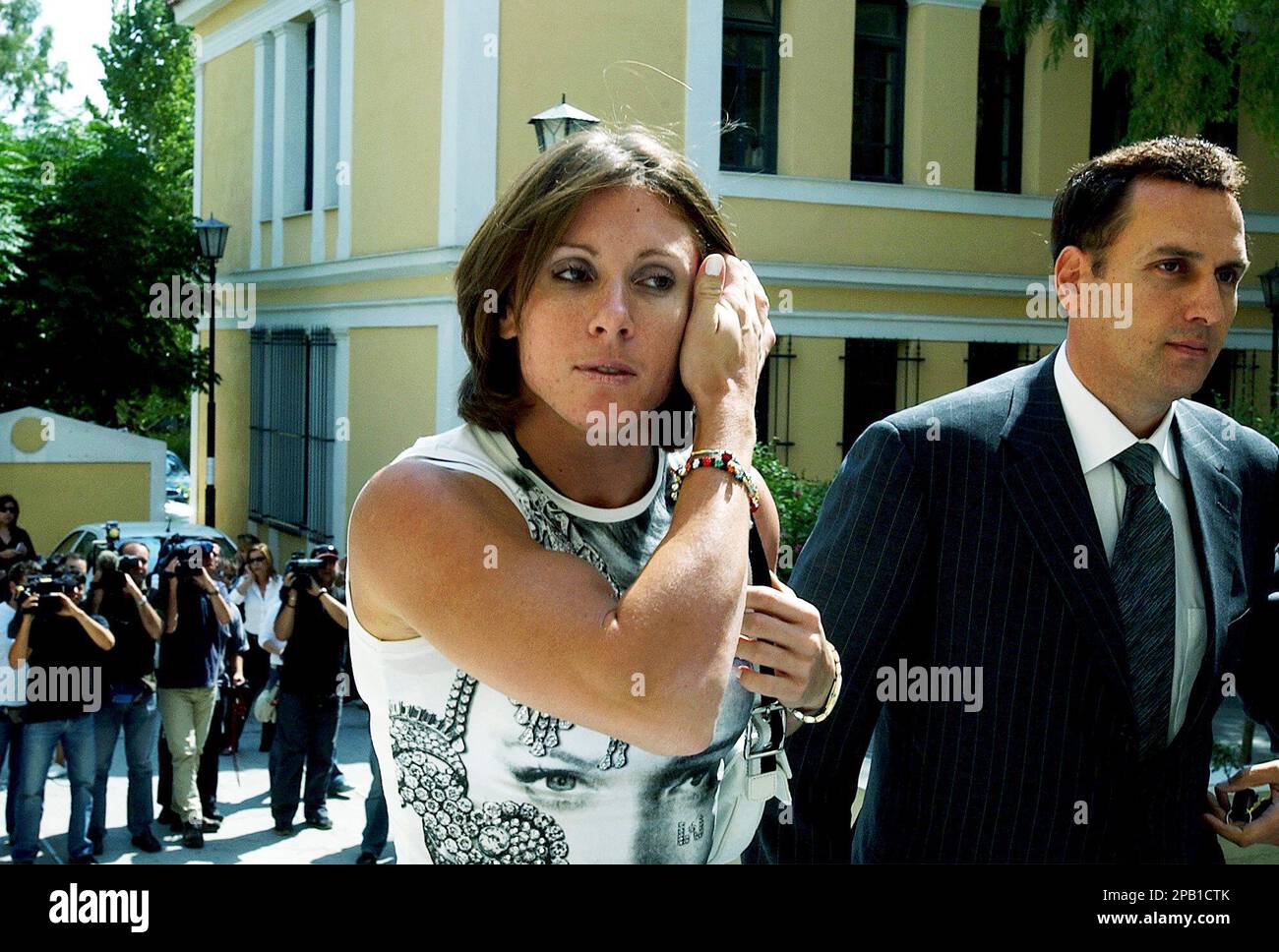 ** FILE ** Greek sprinter Katerina Thanou, left, arrives in court with ...