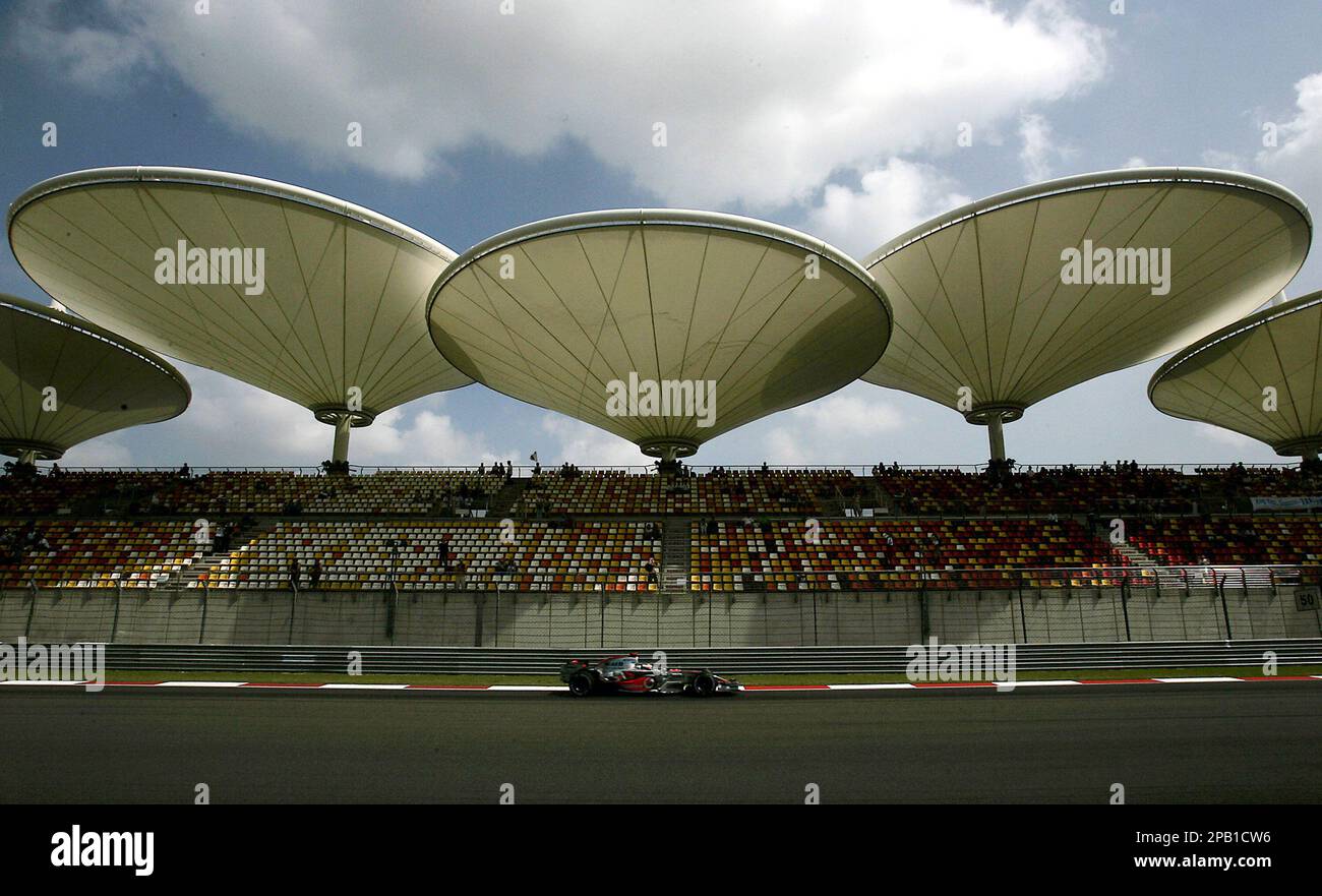 Spanish Fernando Alonso speeds up his McLaren-Mercedes during a ...