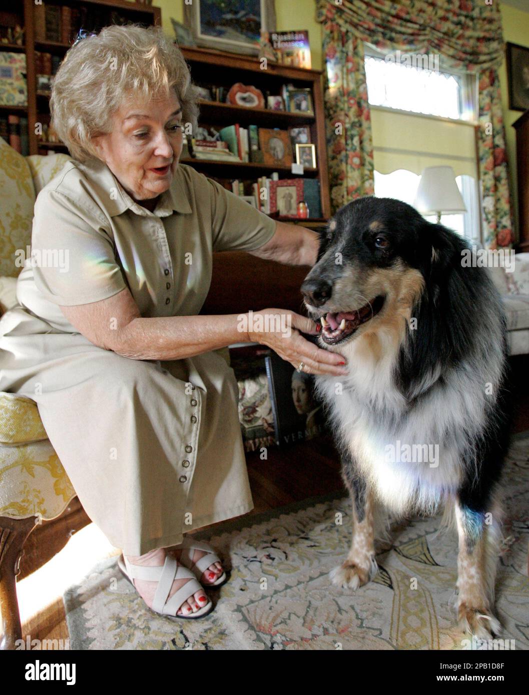 Kathie Svoboda interacts with Rascal, her mixed breed dog, in Lincoln ...