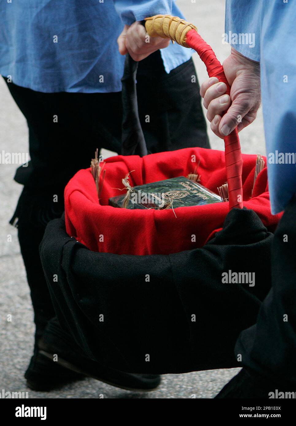 The remains of Mohegan Indian Tribe Chief Ralph W. Sturges are carried ...
