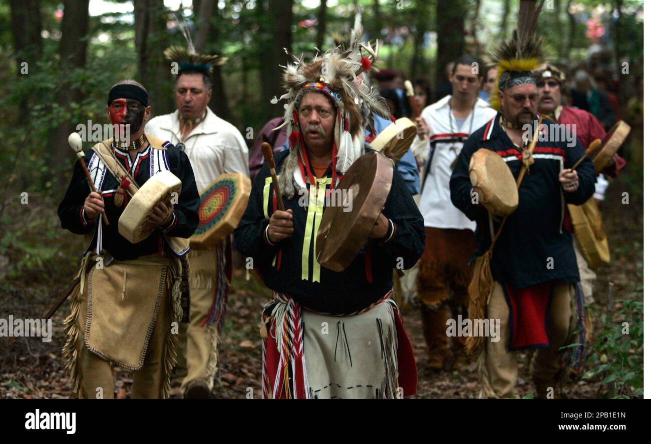 A group of drummers lead the funeral procession of Mohegan Tribe Chief ...