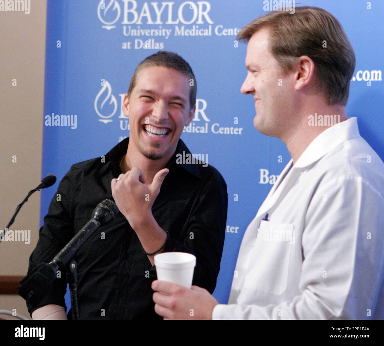Issac Hanson, of the pop group Hanson gestures toward his doctor, Brad ...