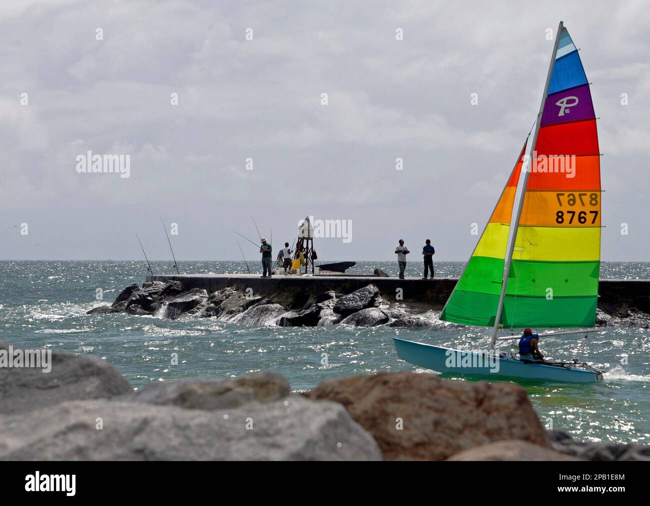 Local residents enjoy a day of fishing in Haulover Beach in Bal Harbour ...
