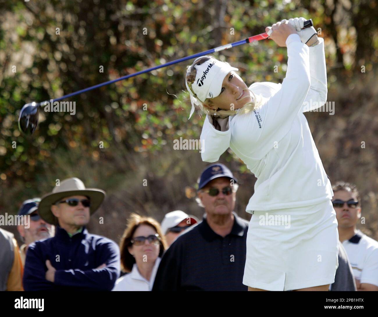 Natalie Gulbis follows her drive off the 17th tee during the first ...