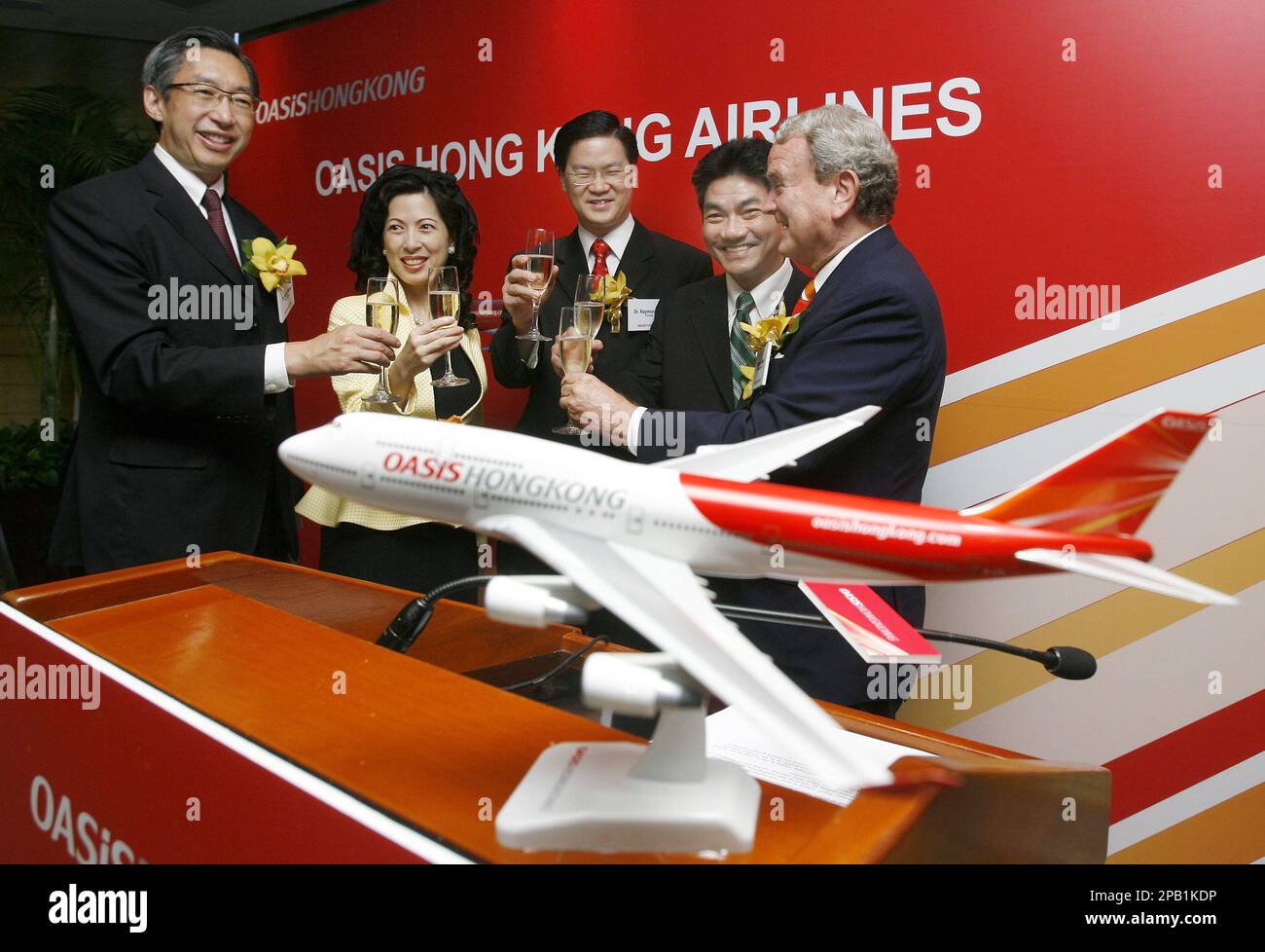 Oasis Hong Kong Airlines Vice chairman Allan Wong, left, Executive ...