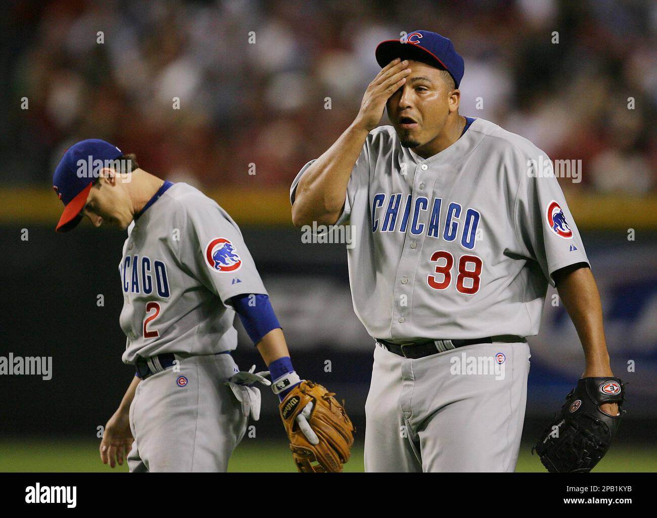 Chicago Cubs' Carlos Zambrano (38) wipes his face after Arizona ...