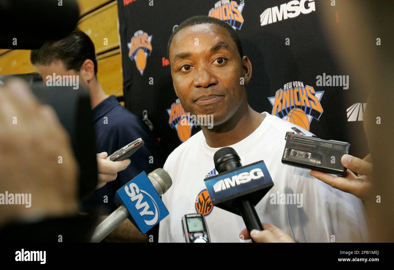 New York Knicks coach Isiah Thomas speaks to the media after basketball ...