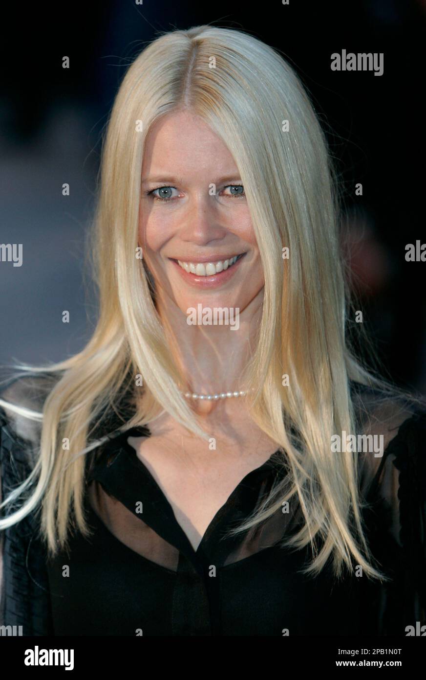 German model Claudia Schiffer poses for photographers as she arrives ...