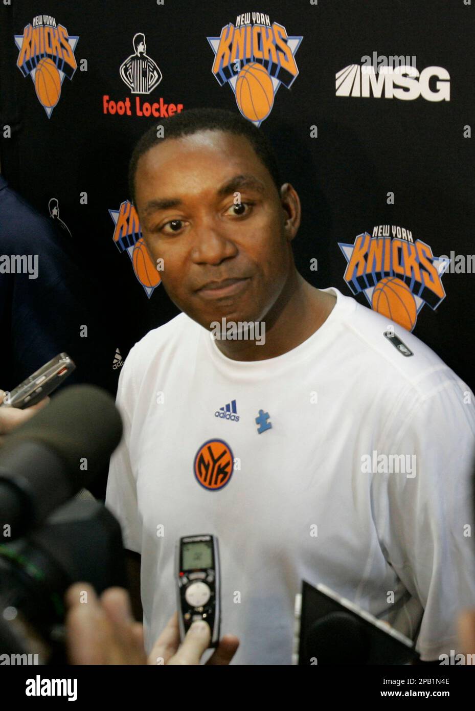 New York Knicks coach Isiah Thomas speaks to the media after practice ...
