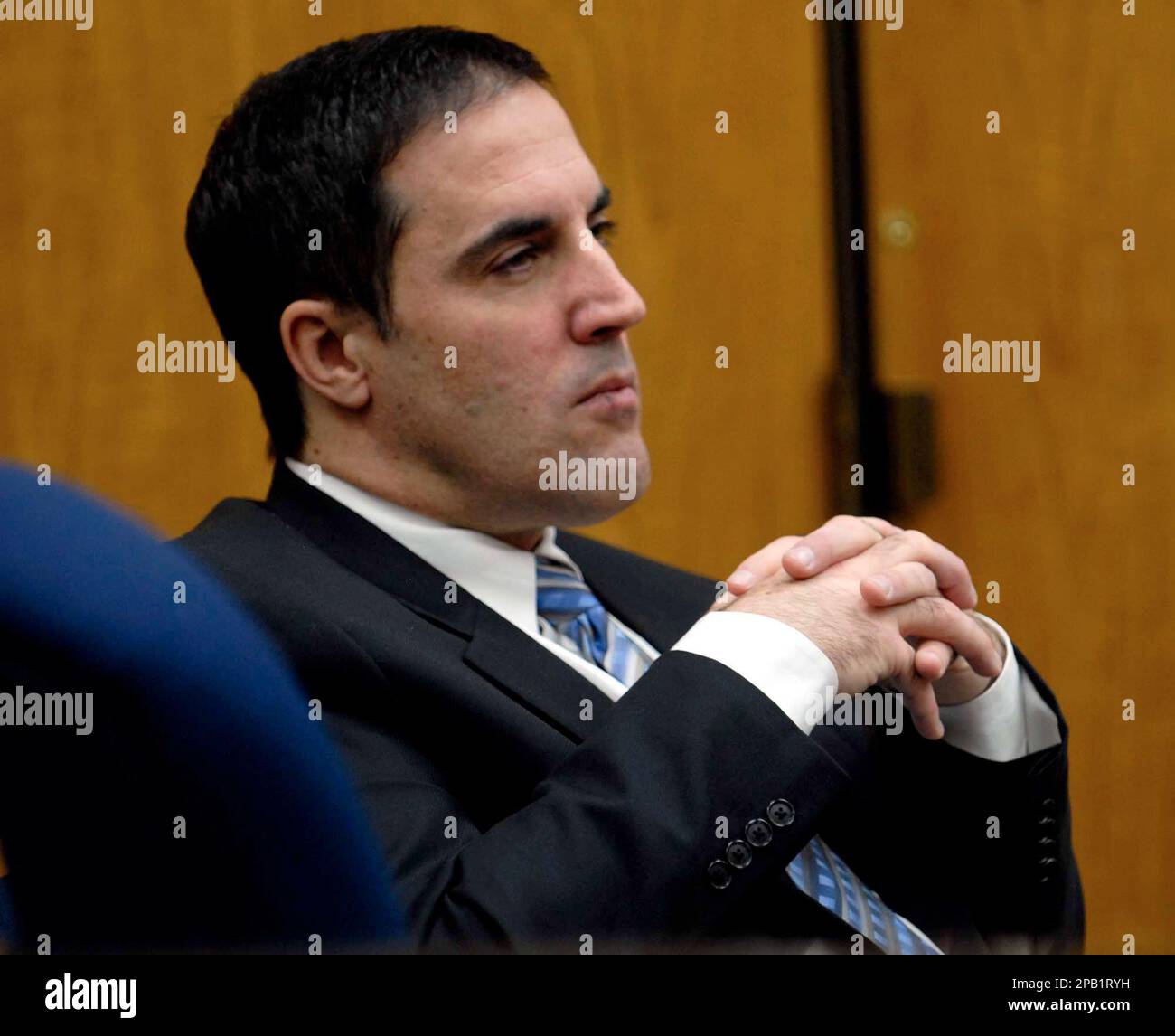 Darren Mack listens as questions are asked of prospective jurors ...