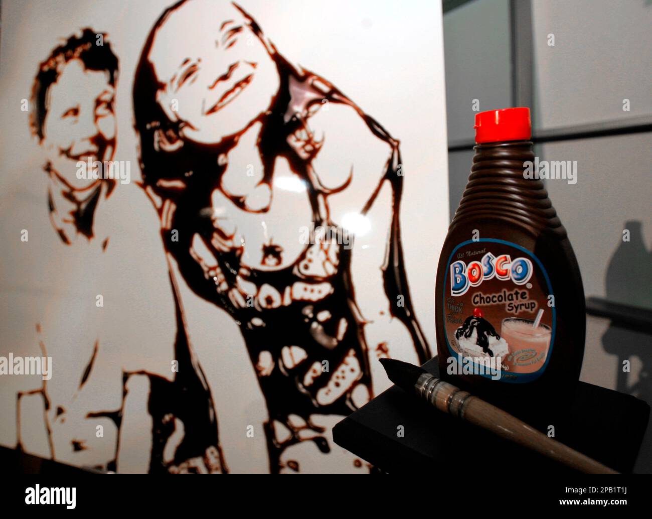 A portrait by Vik Muniz made from Bosco chocolate syrup is shown on ...