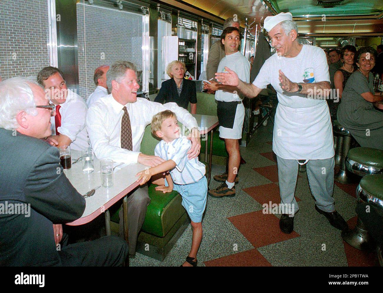 **FILE**With his arm around Nicholas Lines, then-President Bill Clinton ...