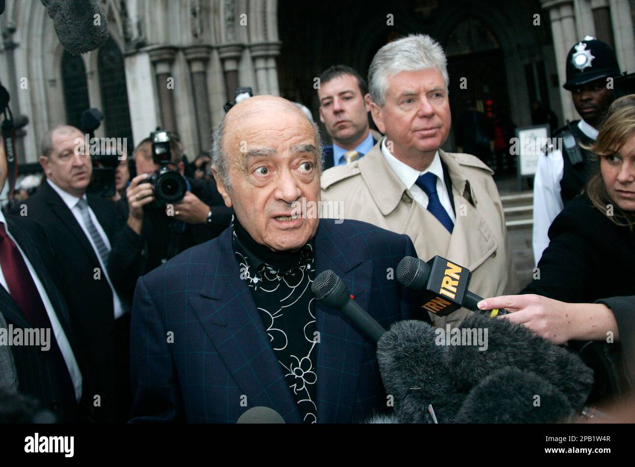 Mohamed Al Fayed speaks to the media as he arrives at the Royal Court ...