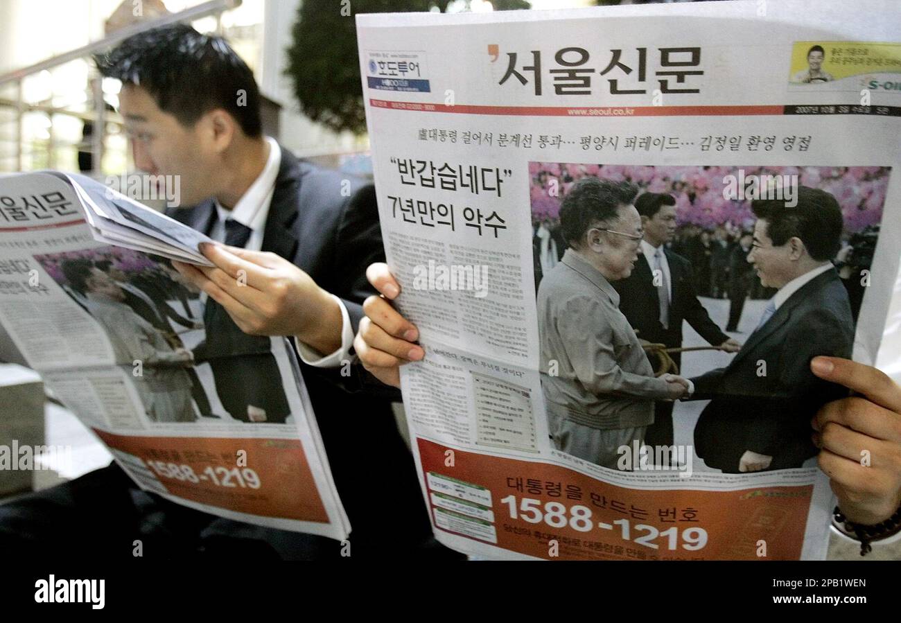 South Koreans read newspapers at downtown of Seoul, South Korea ...