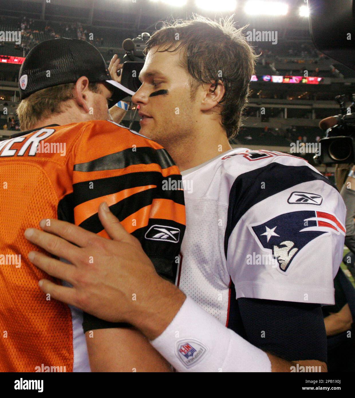 New England Patriots quarterback Tom Brady, right, talks with ...