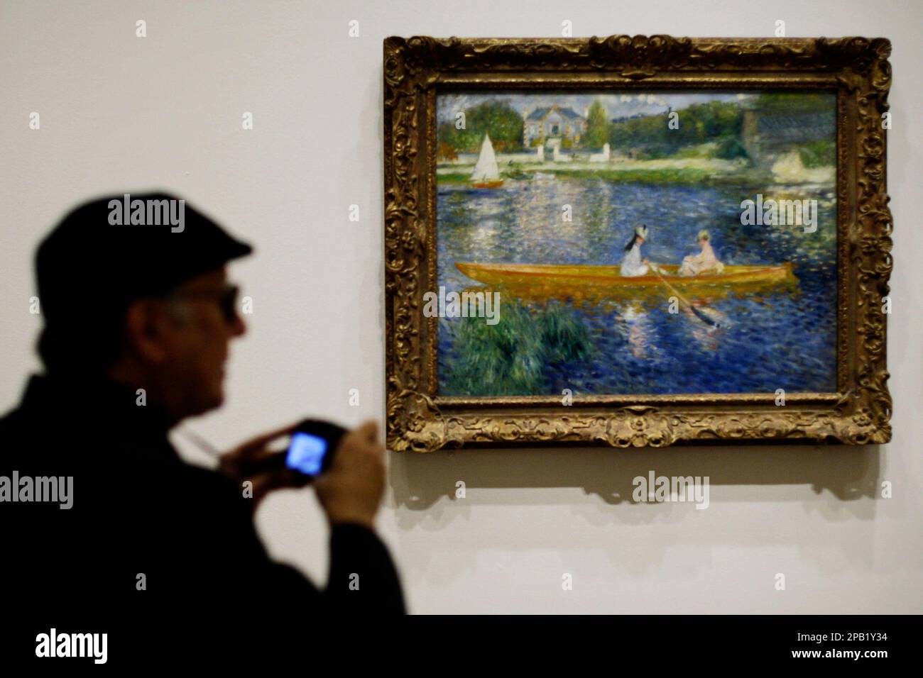 An oil painting by Pierre-Auguste Renoir titled "The Skiff (La Yole ...