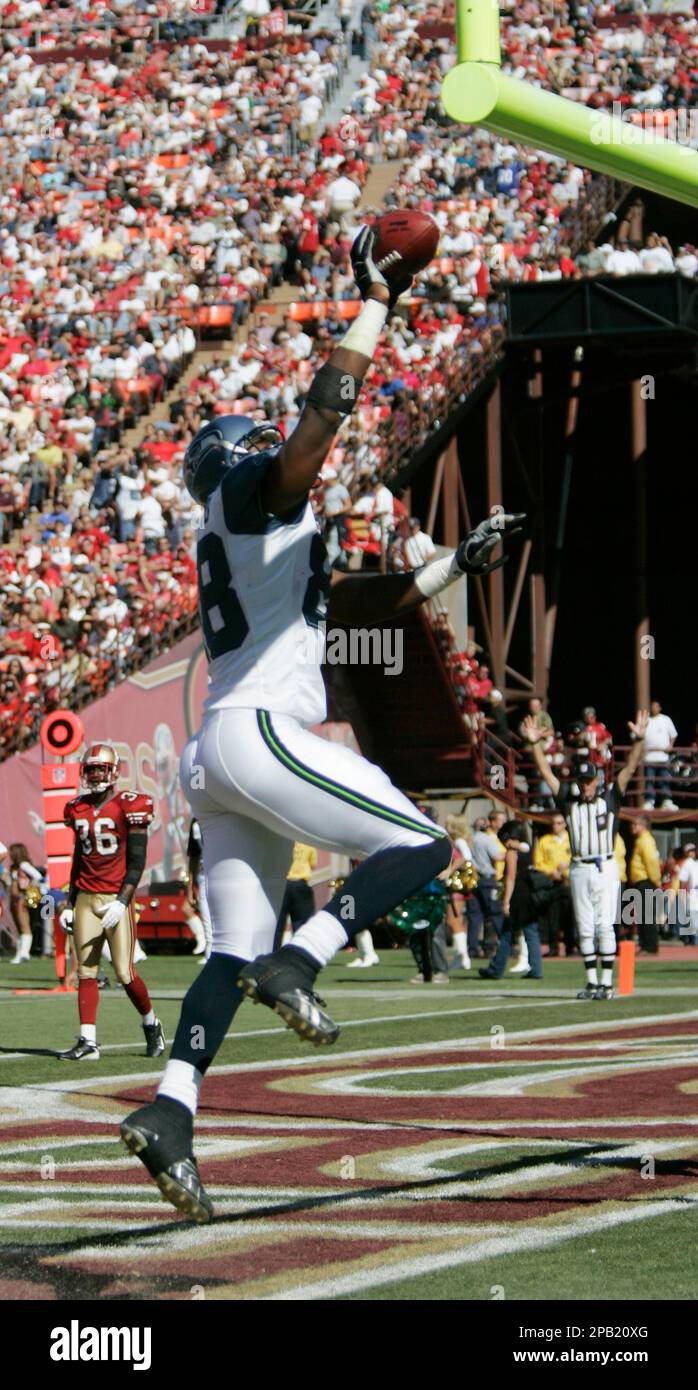 Seattle Seahawks tight end Marcus Pollard (88) dunks the ball over the ...