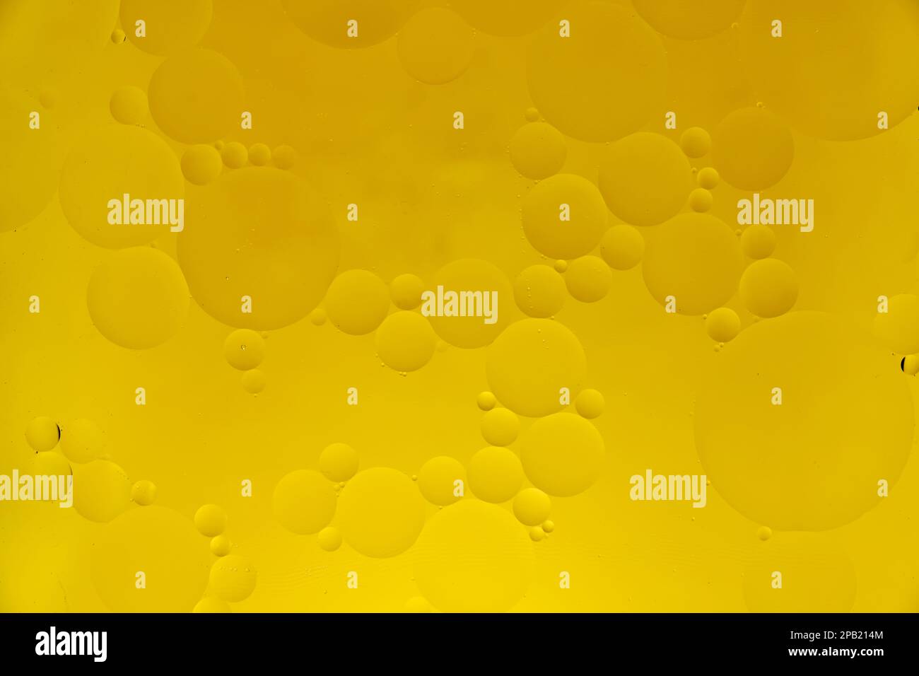 Yellow abstract background with oil circles, streaks and gradient Stock ...