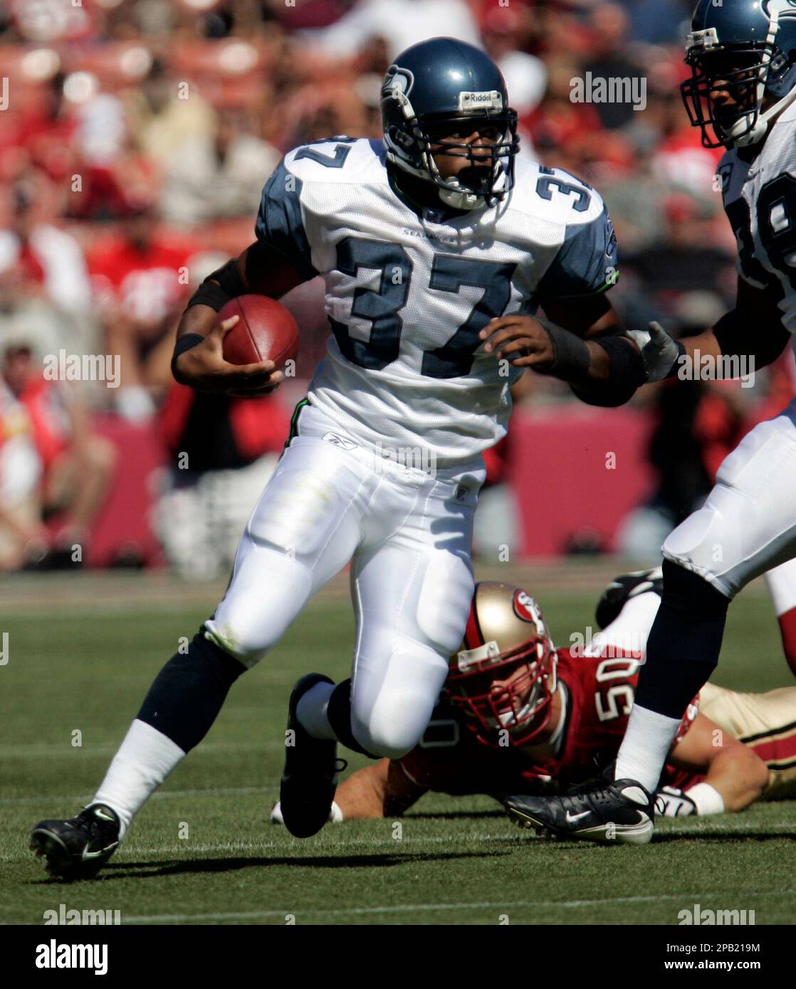 Seattle Seahawks running back Shaun Alexander (37) goes for good ...